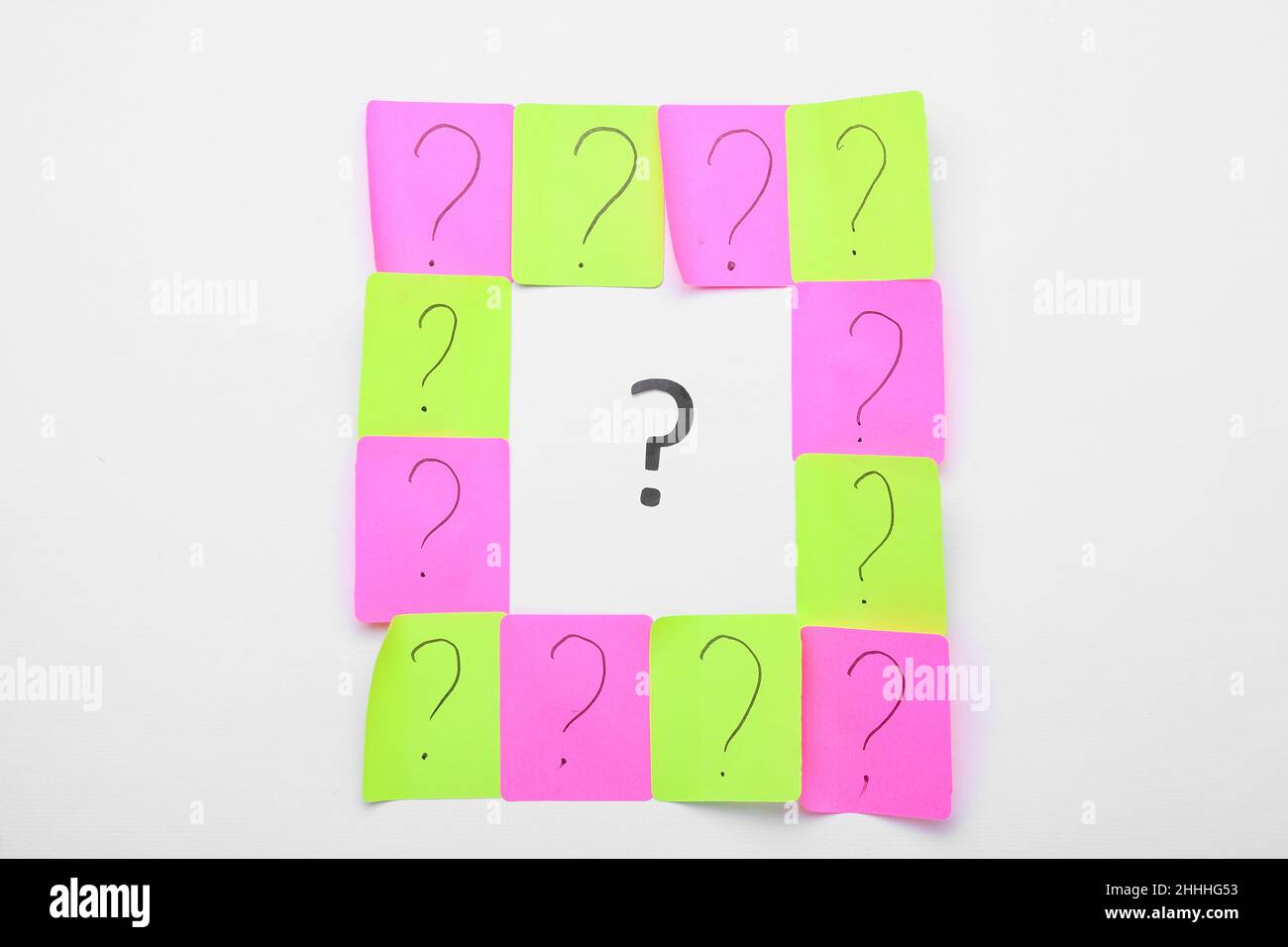 Paper sticks with question marks on white background Stock Photo - Alamy
