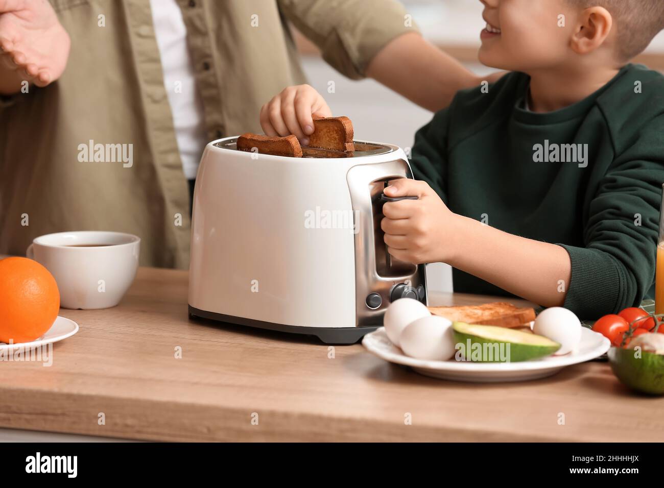 Kid making toast hi-res stock photography and images - Alamy