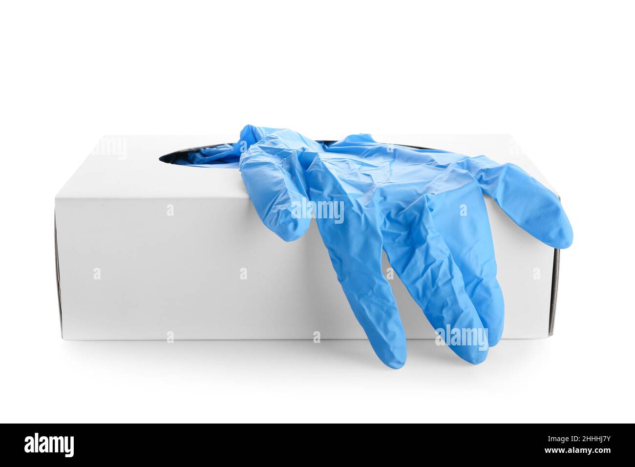 Paper box with blue medical gloves on white background Stock Photo - Alamy