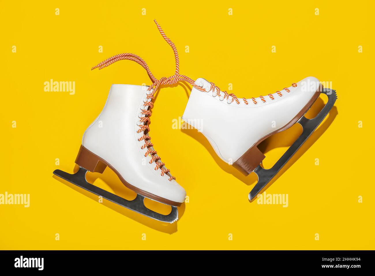 Yellow ice skates hi-res stock photography and images - Alamy