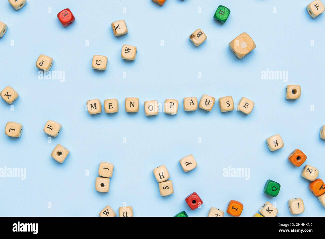 Cubes with word MENOPAUSE on blue background Stock Photo - Alamy