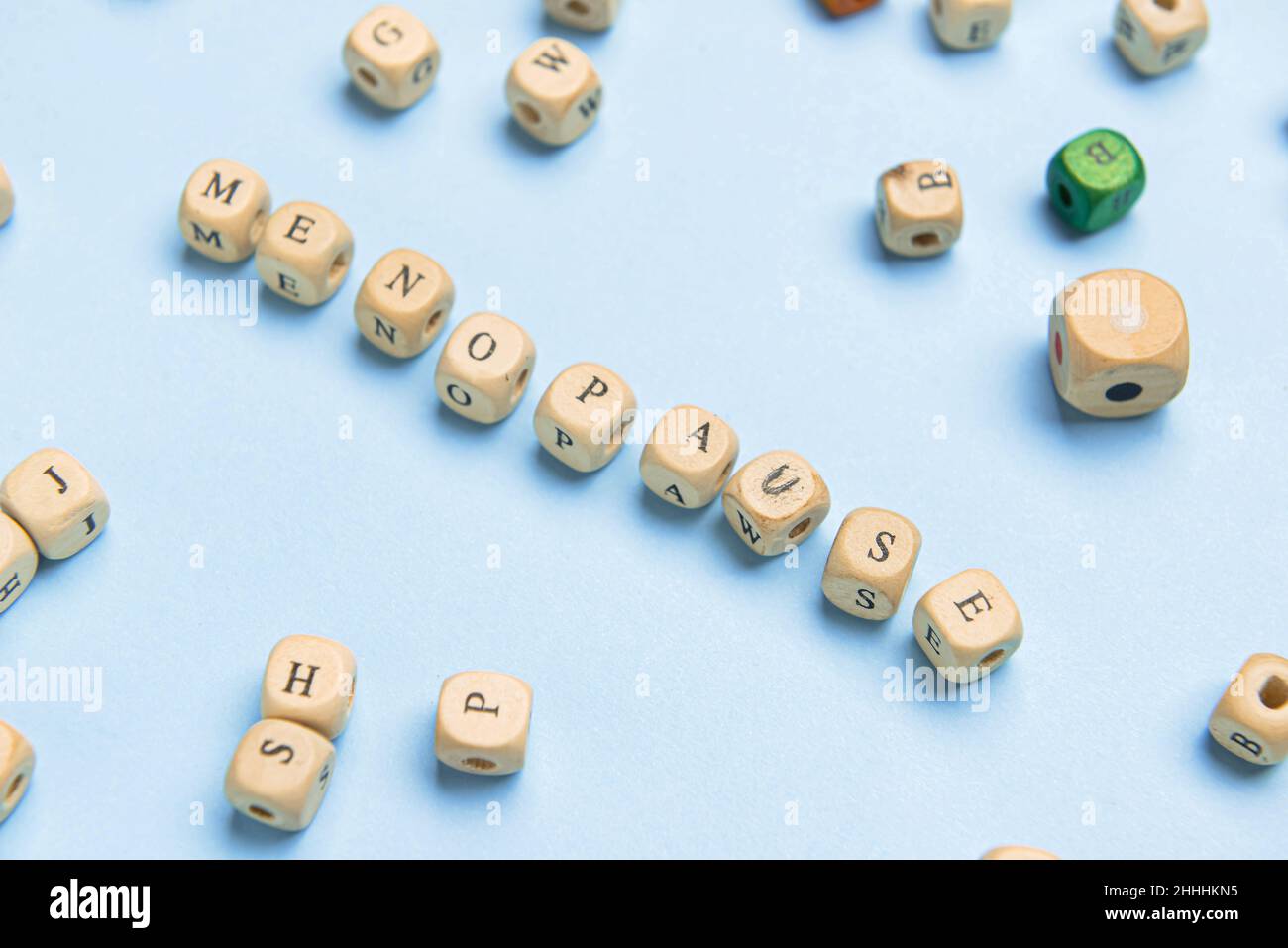 Cubes with word MENOPAUSE on blue background Stock Photo - Alamy