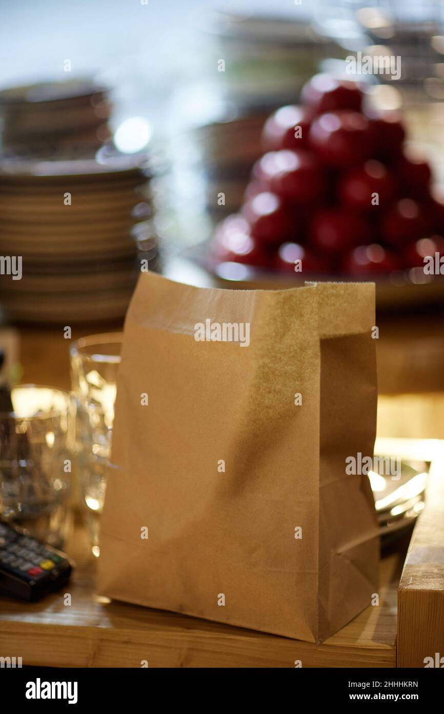 Unpacking paper bag food delivery from restaurant. Chinese food online ...