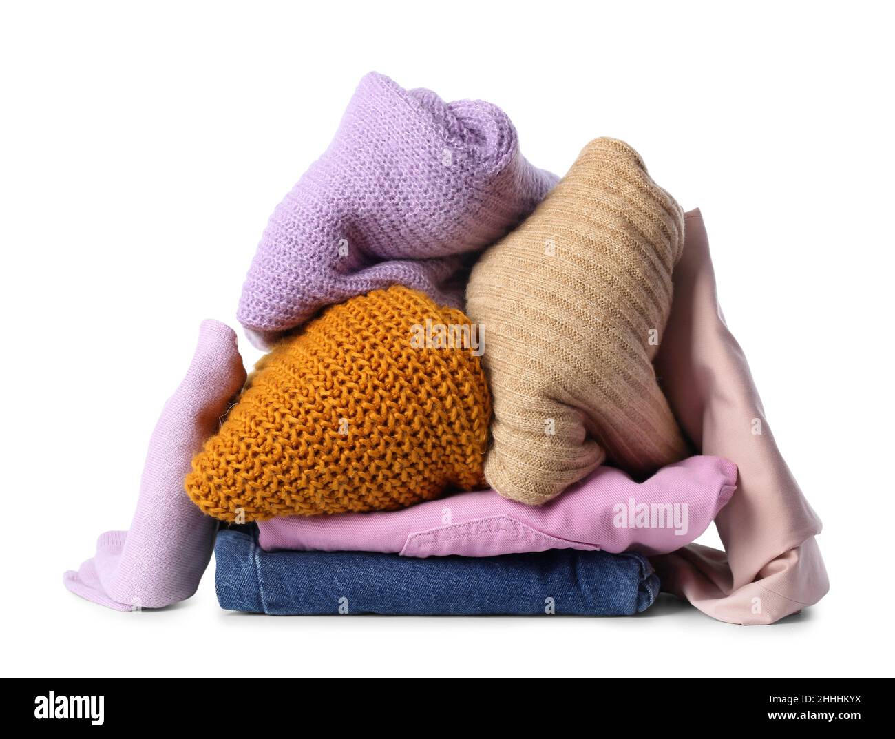 Stack of different stylish female clothes on white background Stock ...