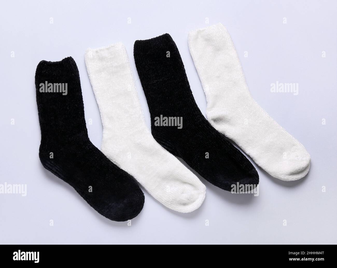Different socks isolated on white background Stock Photo - Alamy