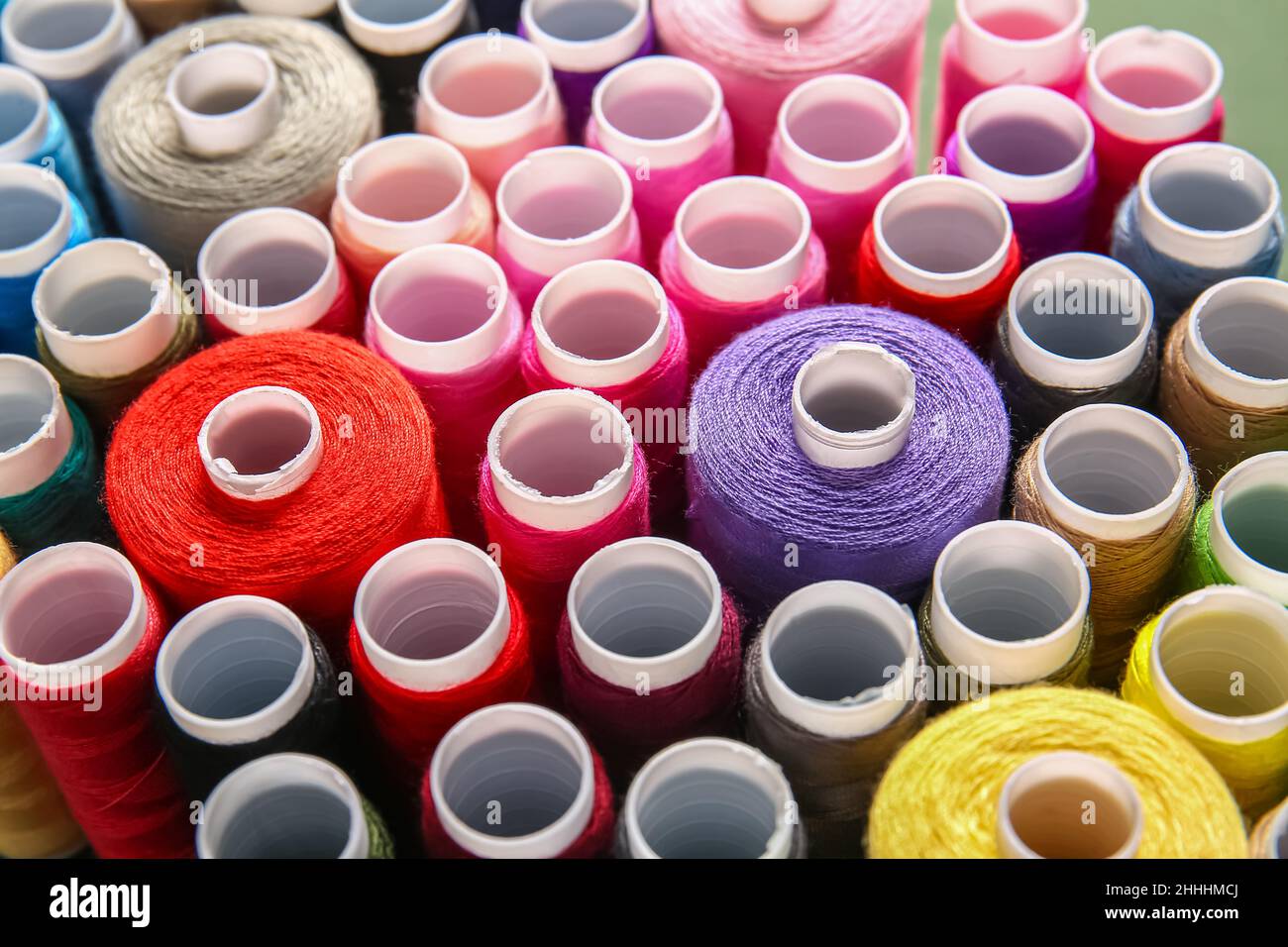 Closeup view of different thread spools Stock Photo - Alamy