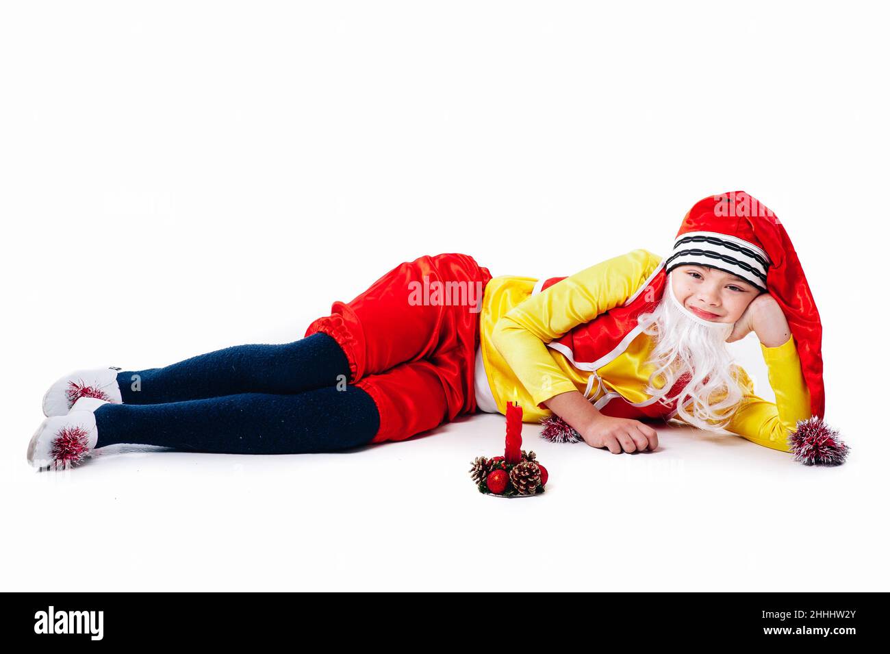 A baby dressed as a elf. isolated. Santa's helper. boy in suit of dwarf ...