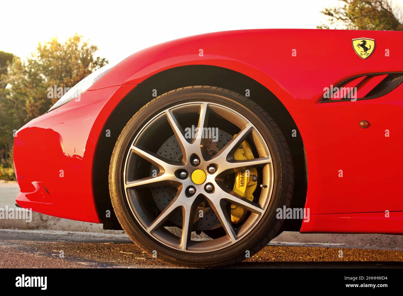 Province of Pisa, July 15th 2021, Side view of a shining red Ferrari at ...