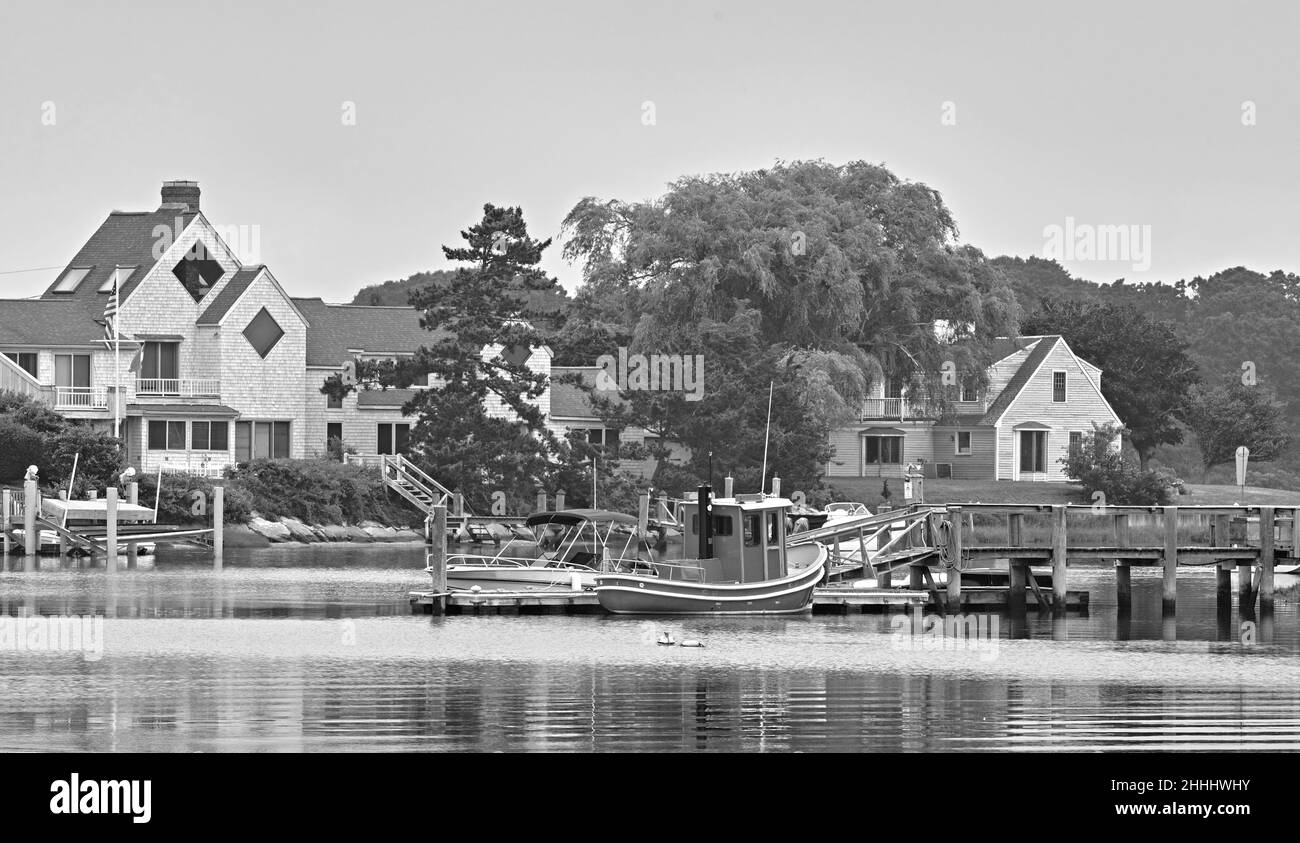 Lewis Bay inlet in Cape Cod,Massachusetts.USA, with a Tugboat on a gray ...