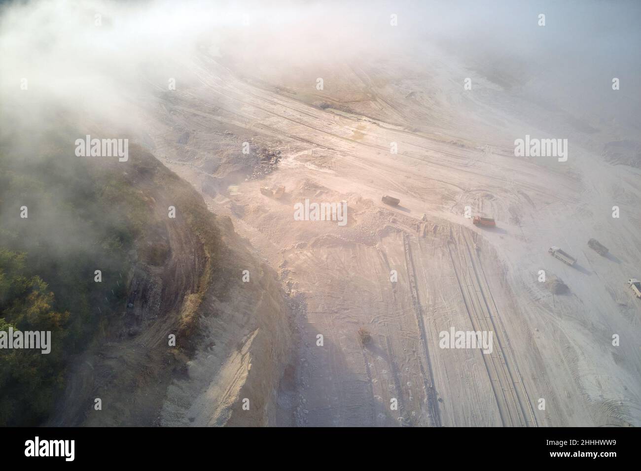 Aerial view of open pit mining of limestone materials for construction ...