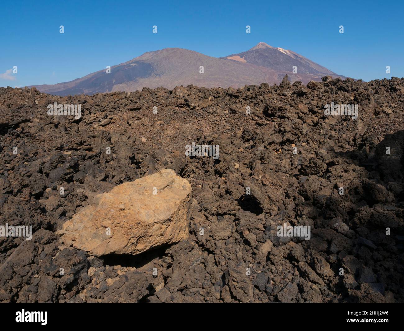 Volcanic flow and contrasting ejecta rock with Mount Teide volcano ...