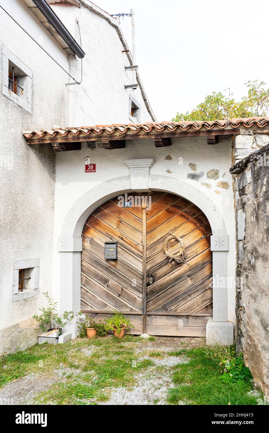 Traditional rustic entrance, big gates, in the Karst region in Slovenia ...