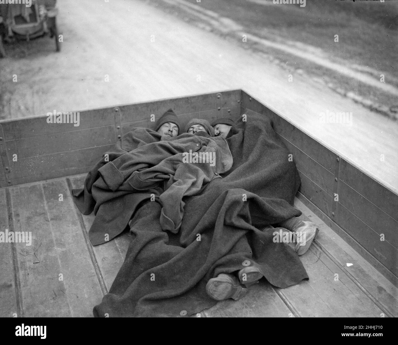Soldiers of the Army Service Corp asleep in the rear of a lorry ...