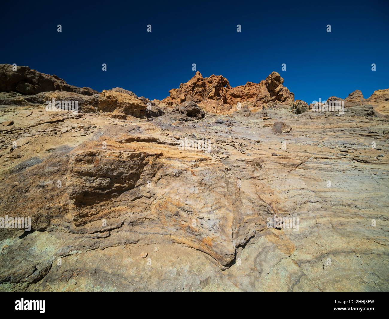 Rocks of the hydrothermal alteration on the TF-21 road towards Mount ...