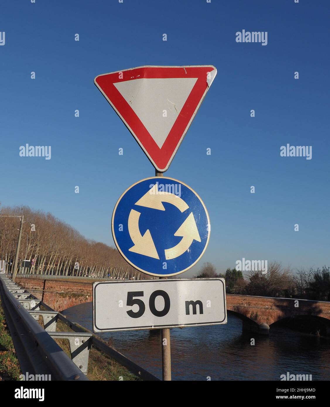 Regulatory signs, give way or yield and roundabout traffic sign Stock ...