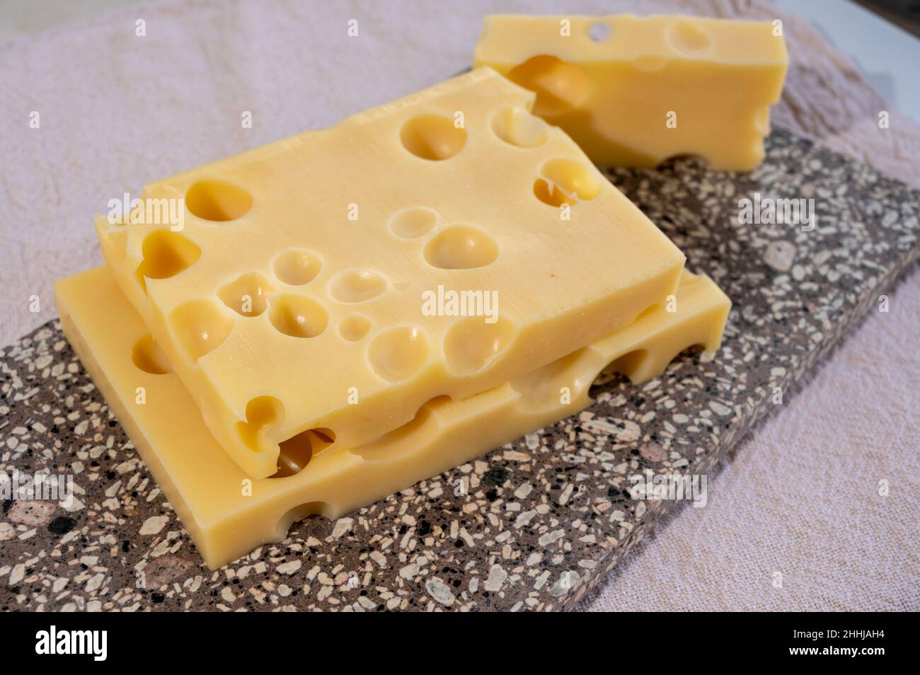 Cheese collection, semi-hard French cheese emmentaler with round holes ...