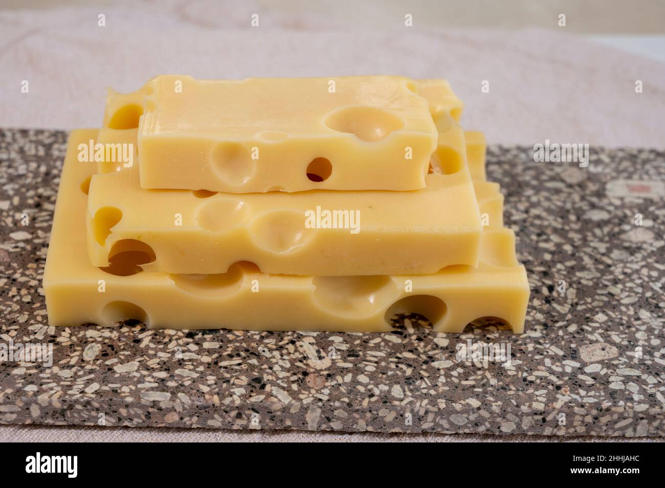 Cheese collection, semi-hard French cheese emmentaler with round holes ...