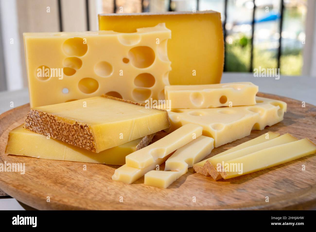 Cheese collection, hard French cheeses comte and emmentaler with round ...