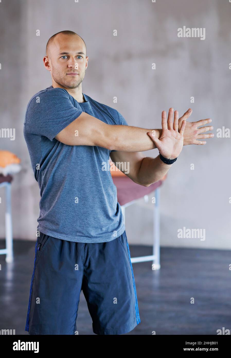 Work out all those kinks. A cropped shot of a handsome trainer ...