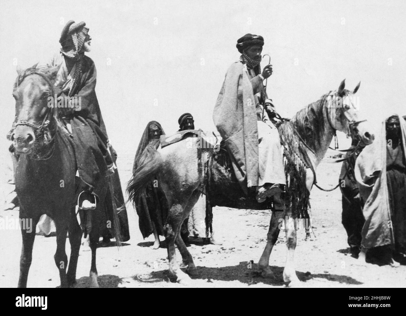 Sheikh Mahmud of the Bani Tamim Tribe (looking into camera) seen here ...