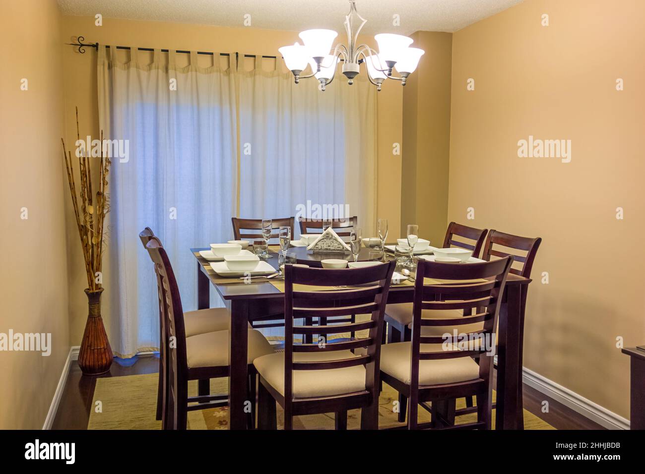 Dining Room with set table for 8 people Stock Photo - Alamy