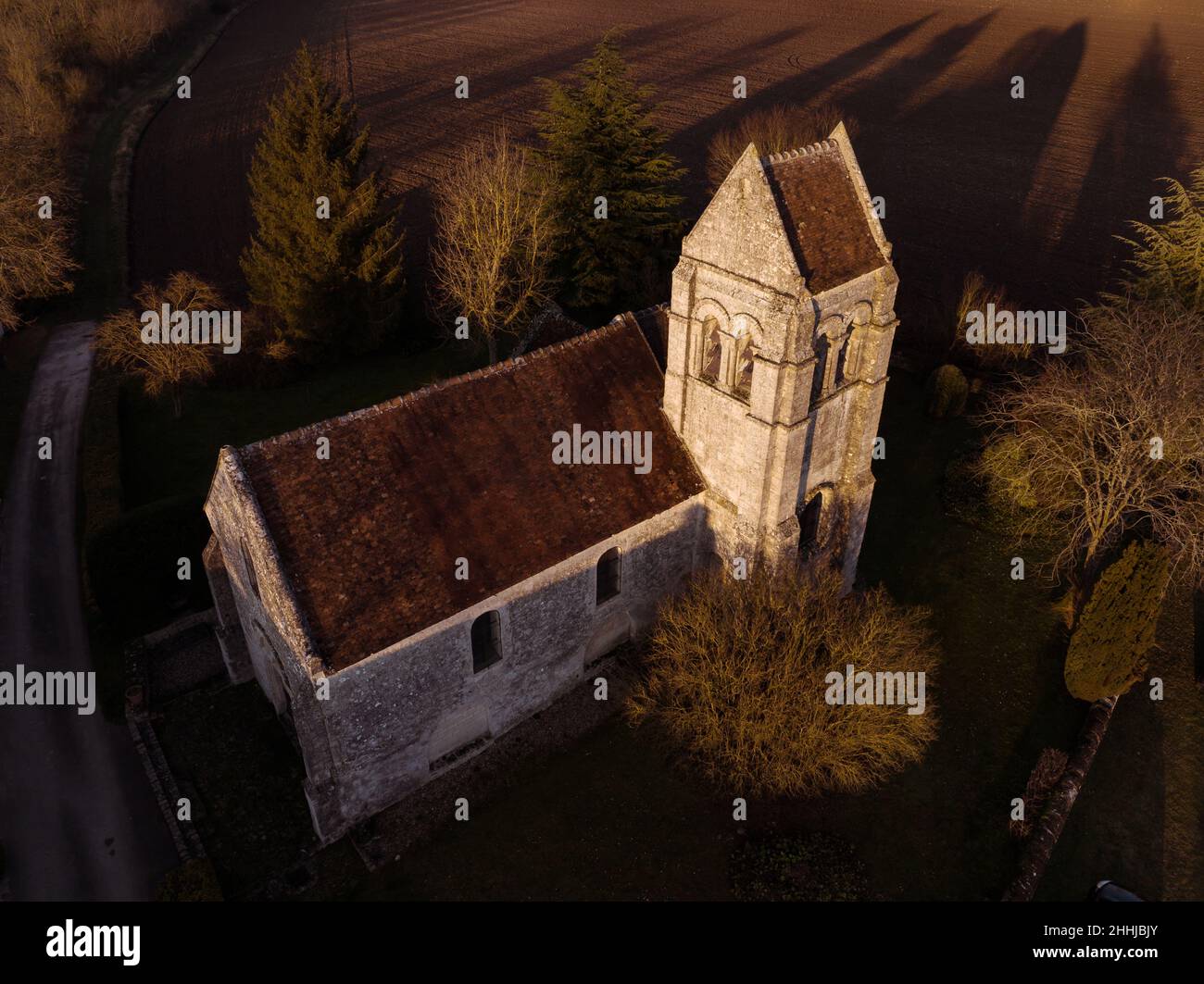 Aerial view of a roman church in France Stock Photo - Alamy