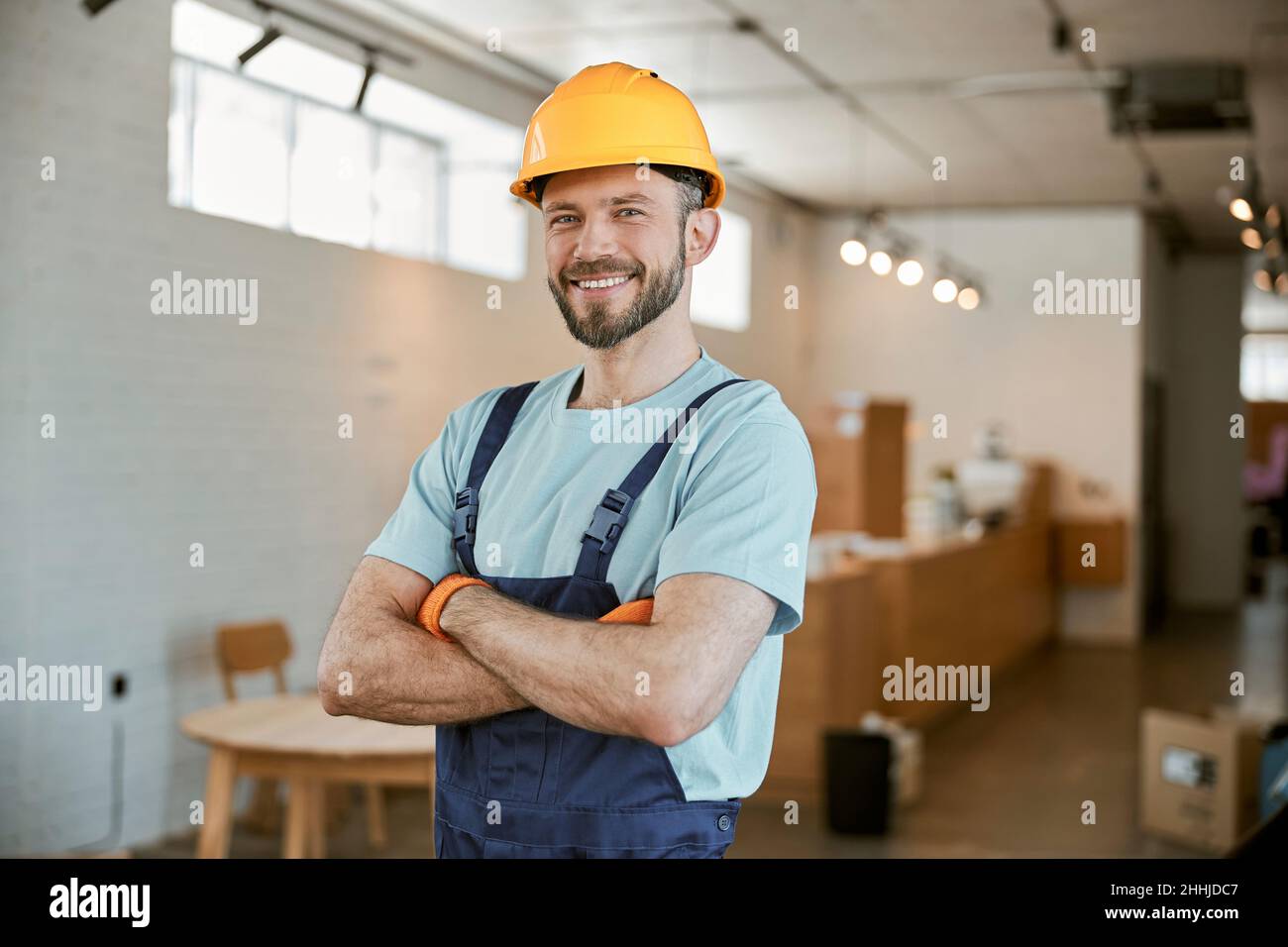 Construction worker helmet standing hi-res stock photography and images ...