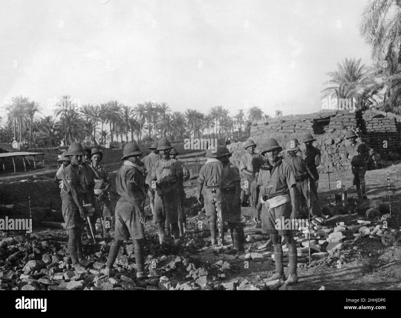 British soldiers laying the foundation for field gun emplacements in ...