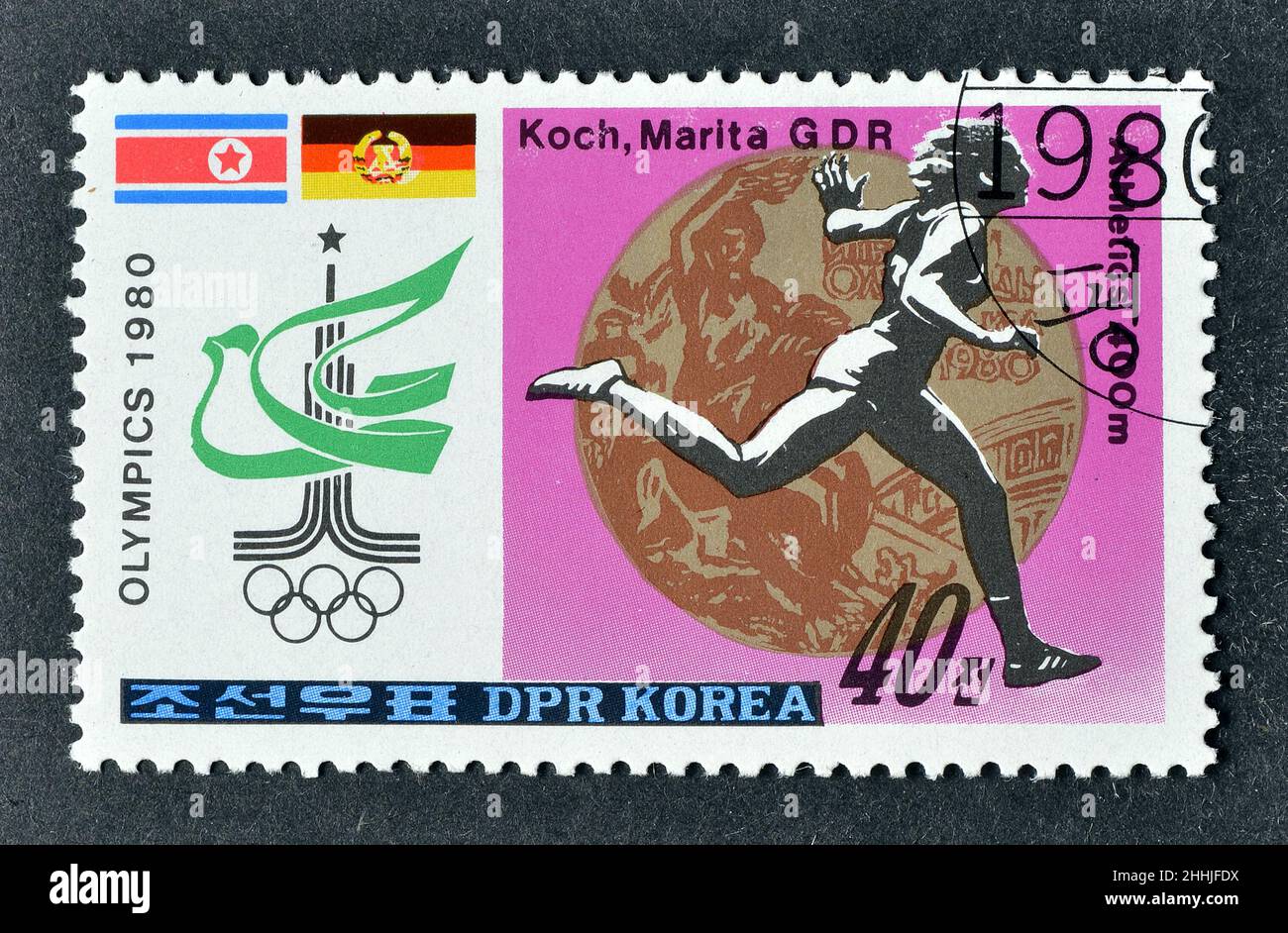 Cancelled postage stamp printed by North Korea, that shows Running ...