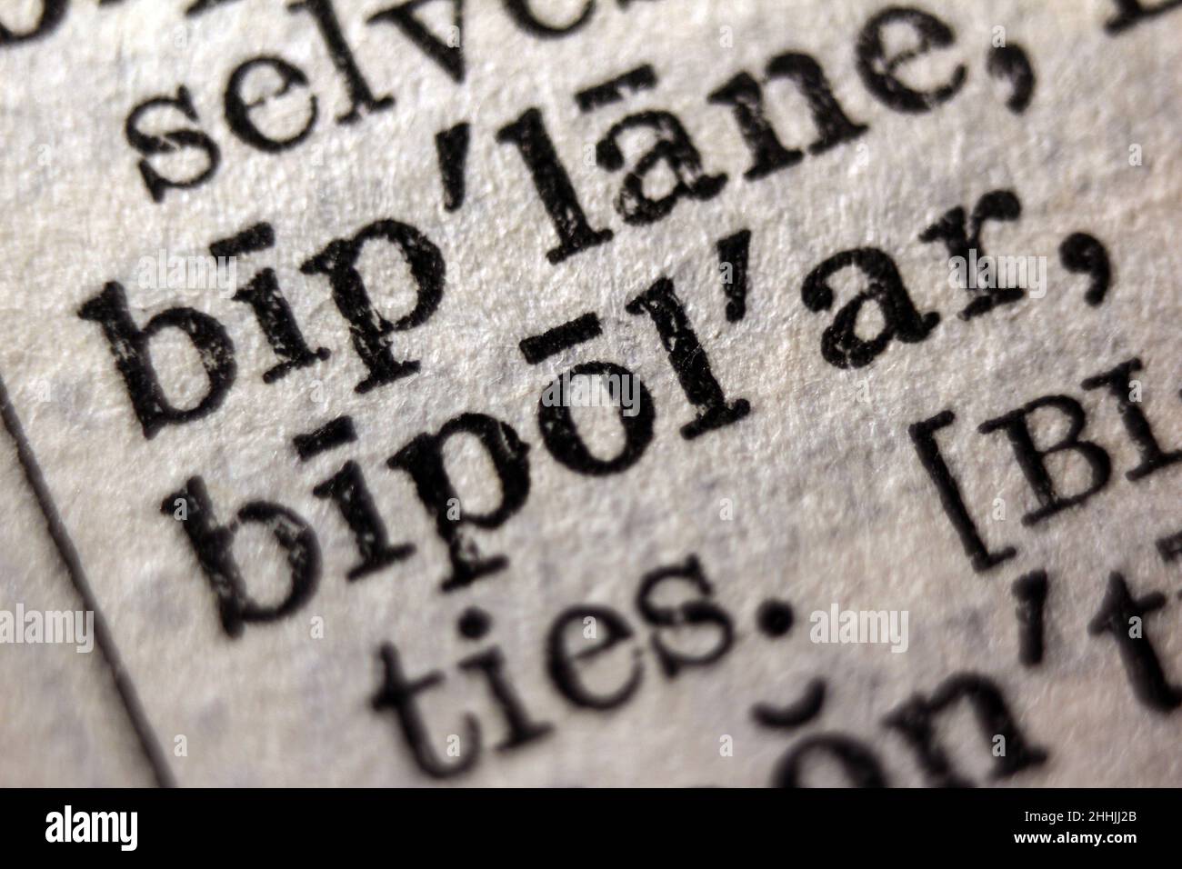 Definition of word bipolar on dictionary page, close-up Stock Photo - Alamy