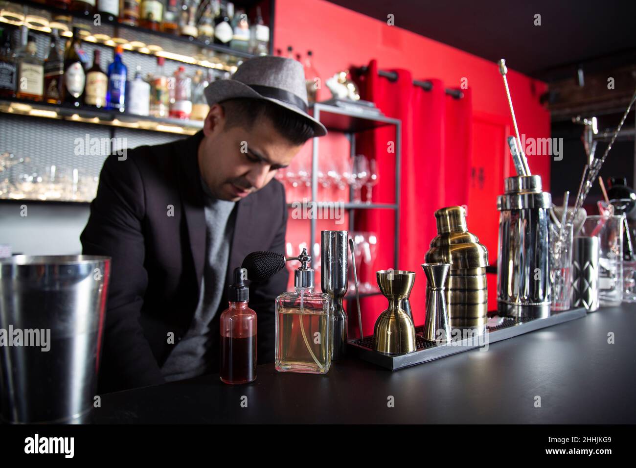 Bartender bottle behind bar hi-res stock photography and images - Alamy