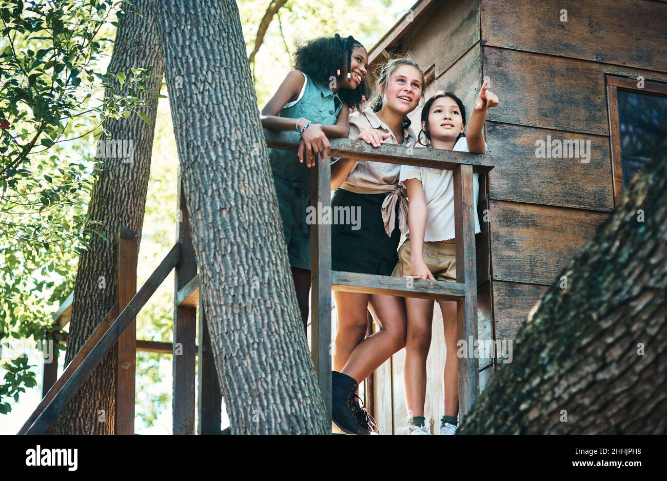 Our very own little hideout. Shot of a group of teenage girls standing ...