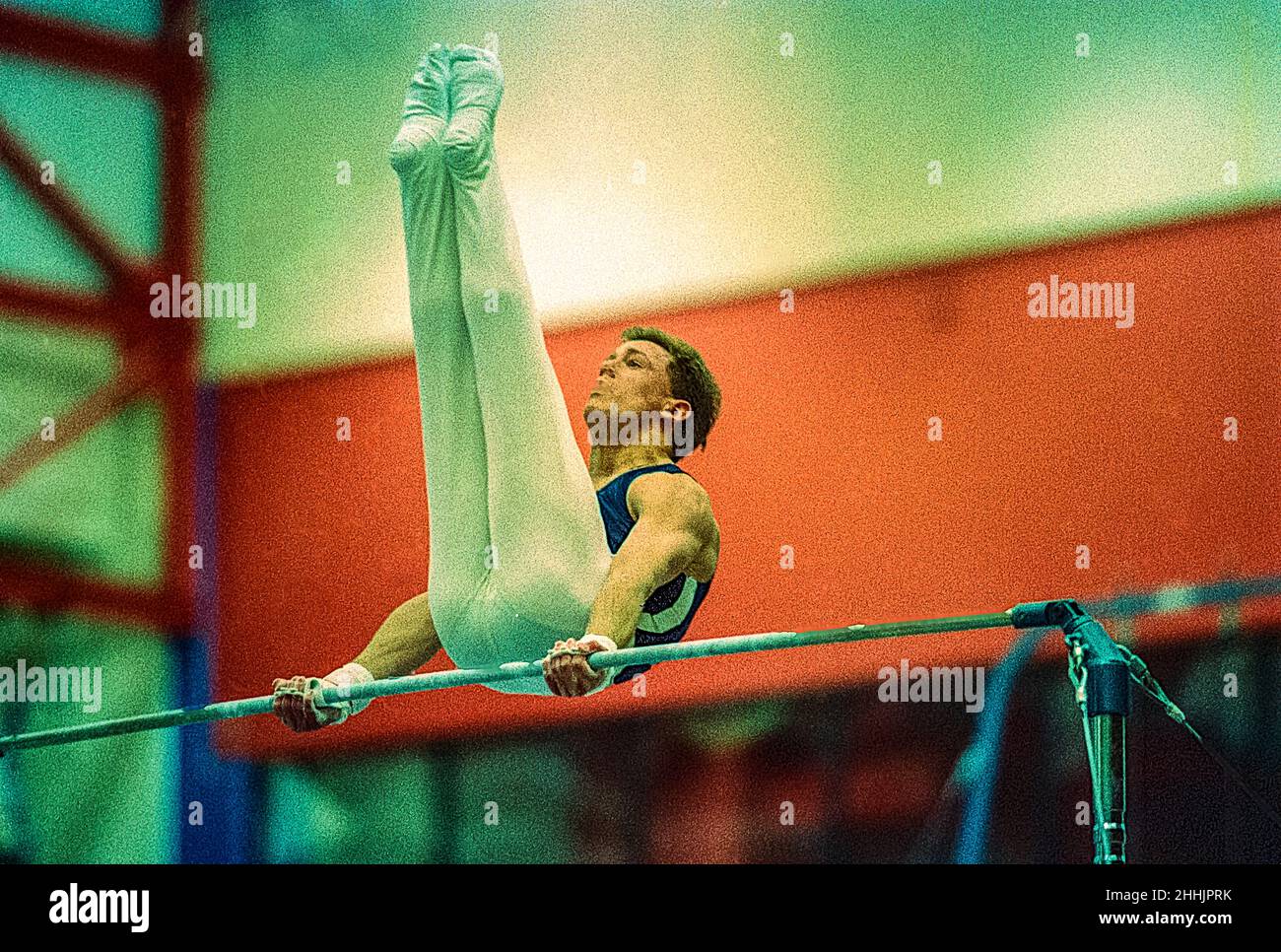 Male gymnast performs on the horizontal bar Stock Photo - Alamy