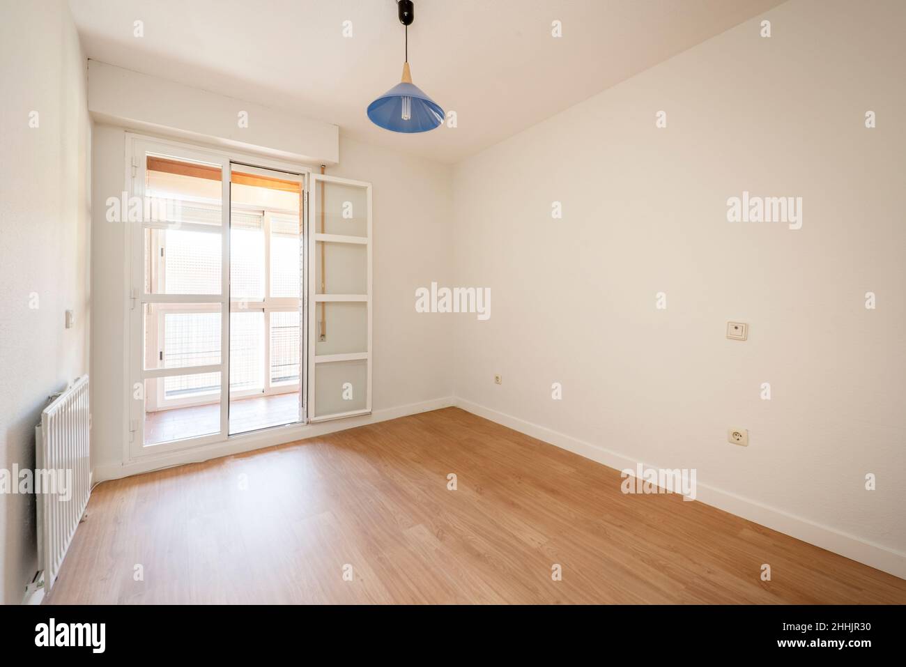 Room with window leading to a closed terrace with glass and wooden ...
