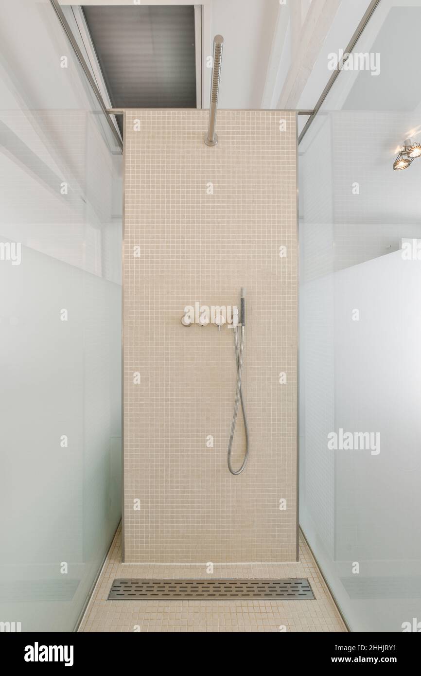 Interior of empty contemporary shower cabin with set and clear white ...