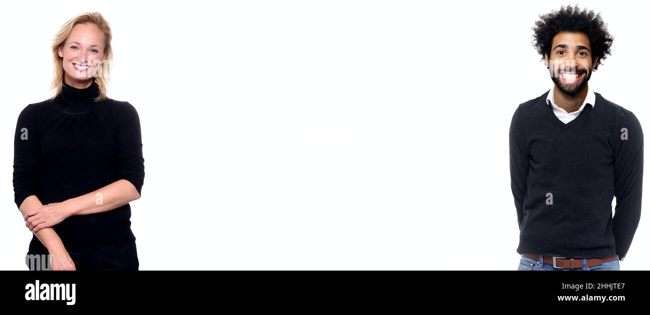 Two people in front of a white background with a white space in between ...