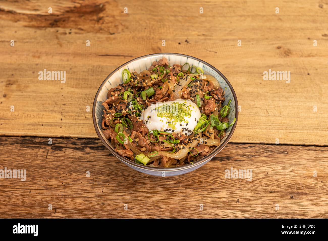 Gyudon is a beef bowl, it is a Japanese cuisine dish consisting of a ...