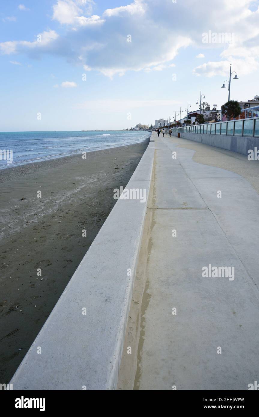 Vertical shot of a walking path near a sunny shore Stock Photo - Alamy