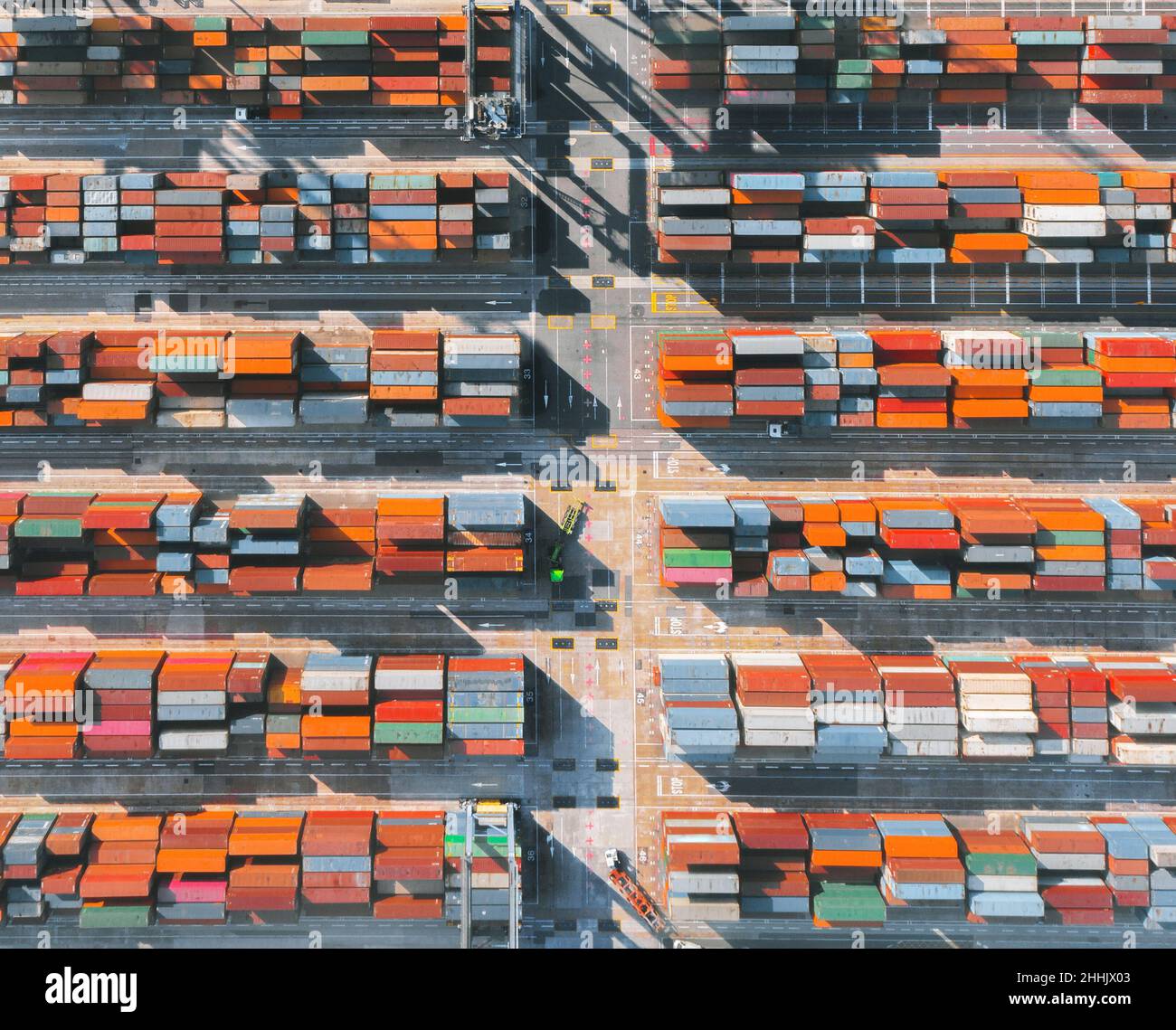 Full frame of drone view of multicolored cargo containers arranged in ...