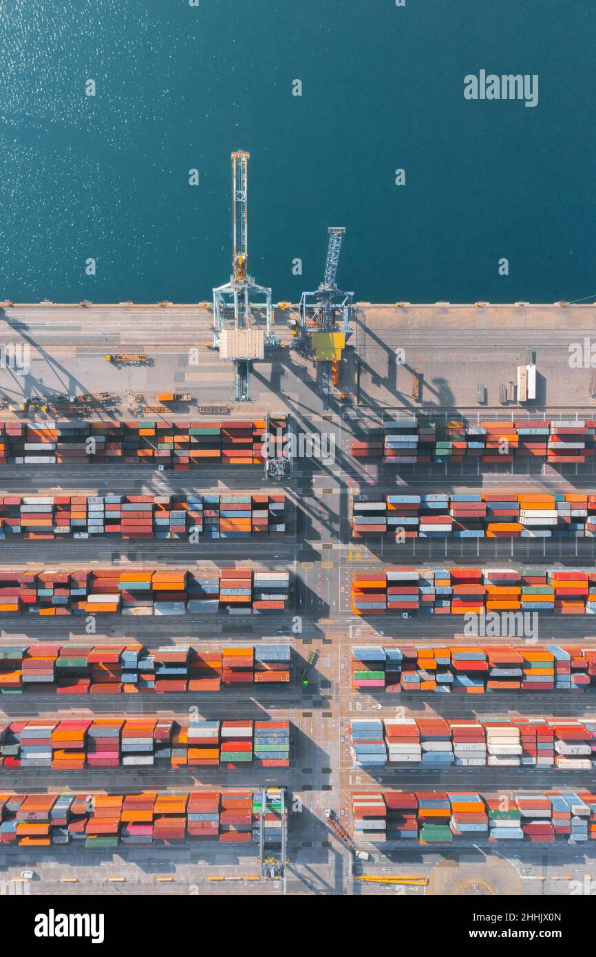 Full frame of drone view of multicolored cargo containers arranged in ...