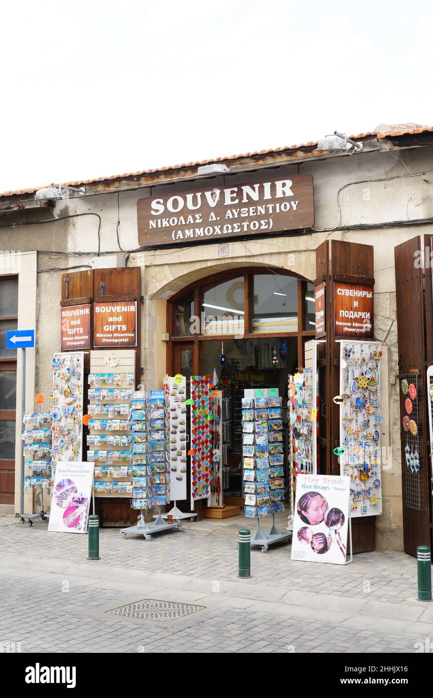 Front entrance with open doors of a souvenir store Stock Photo - Alamy