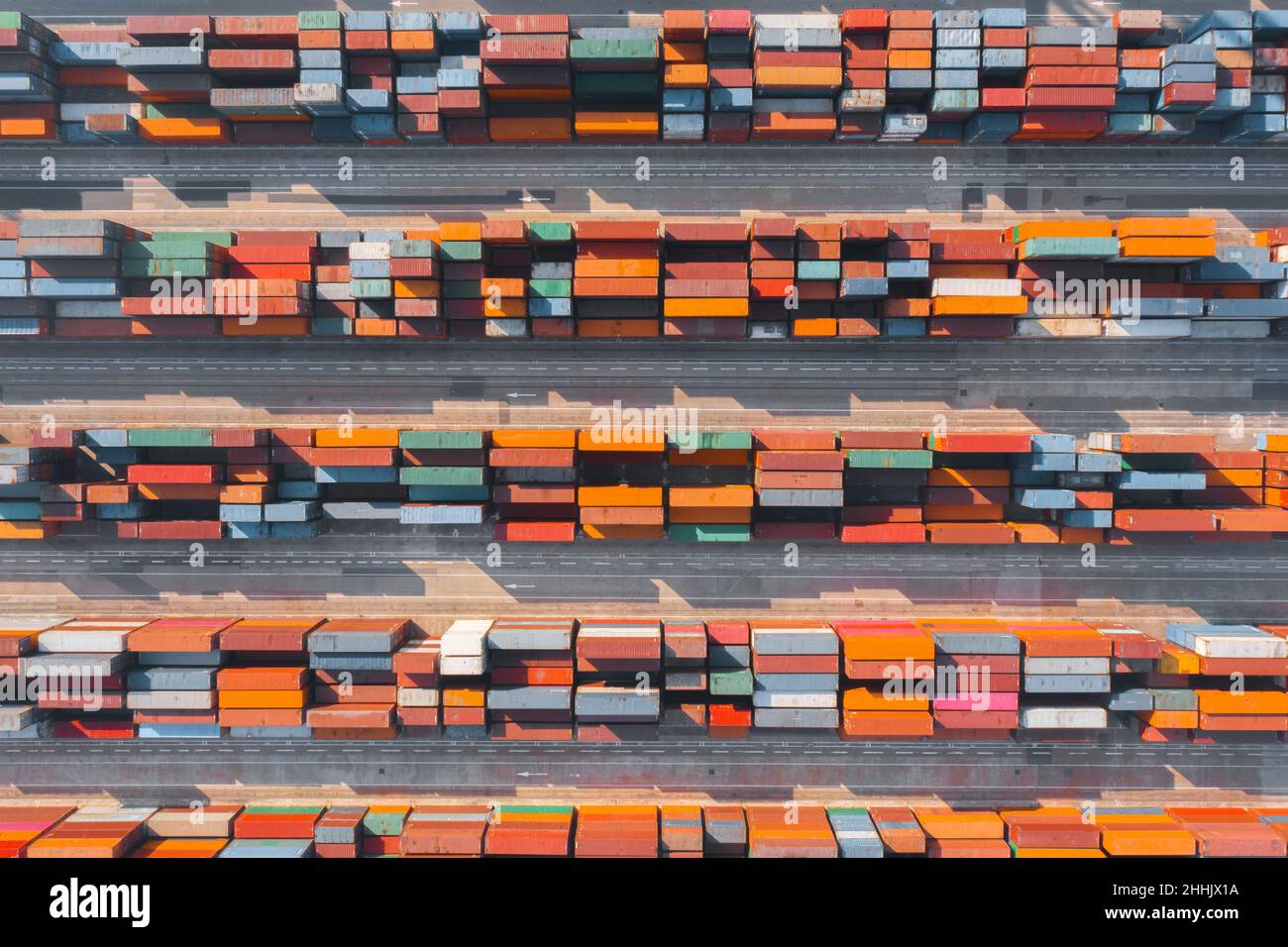 Full frame of drone view of multicolored cargo containers arranged in ...