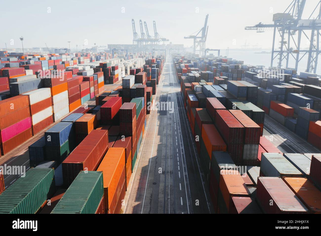 From above perspective view of various colorful containers stacked on ...