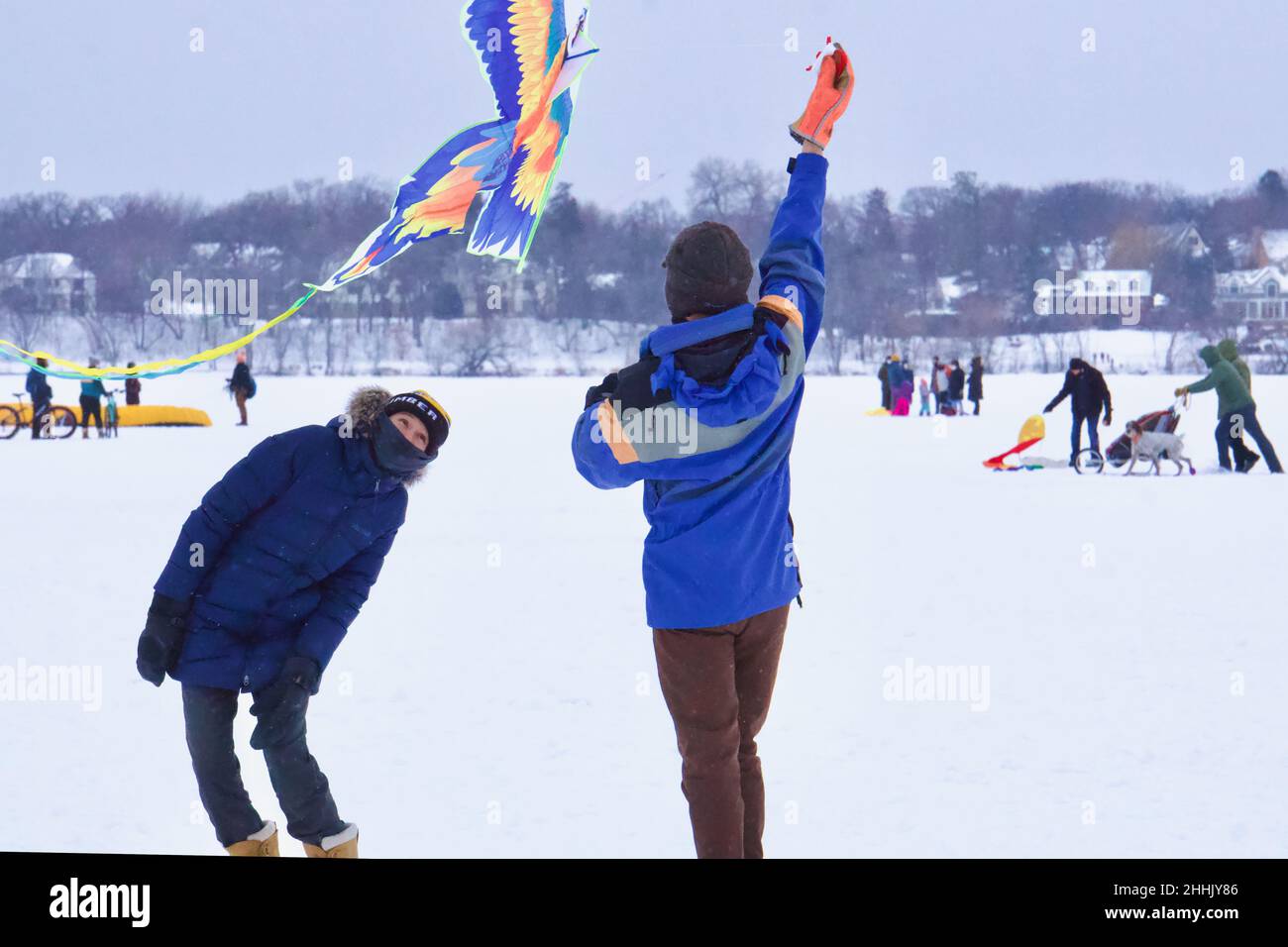 Lake Harriet Winter Kite Festival on frozen lake, in January. Fun ...