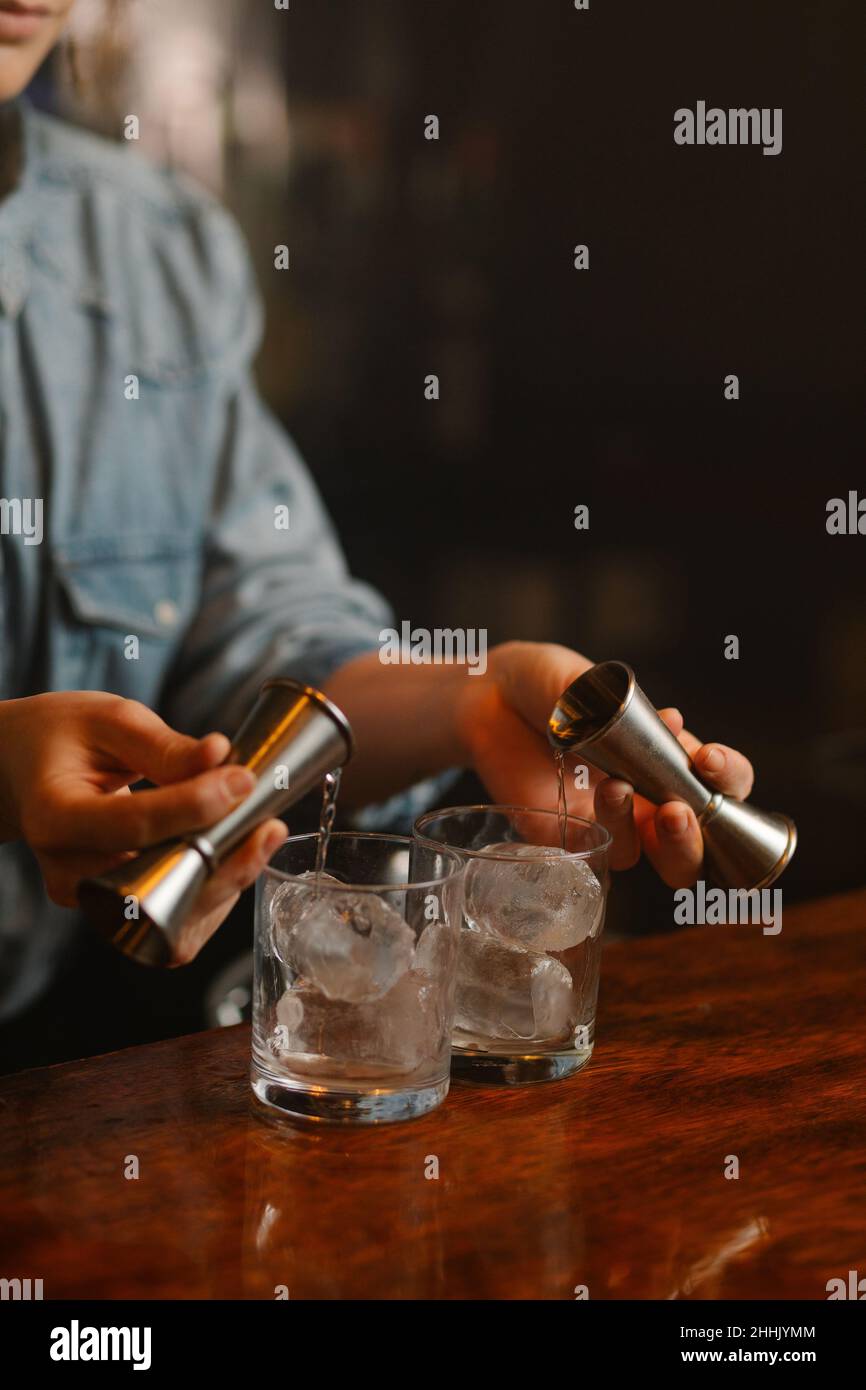 Pouring tasty whiskey from hi-res stock photography and images - Alamy