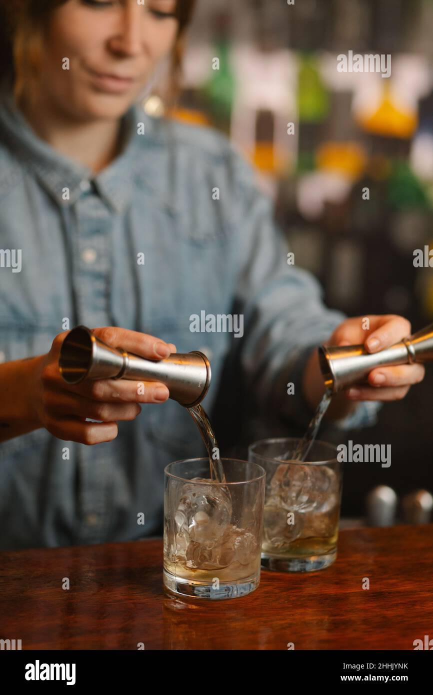Pouring tasty whiskey from hi-res stock photography and images - Alamy