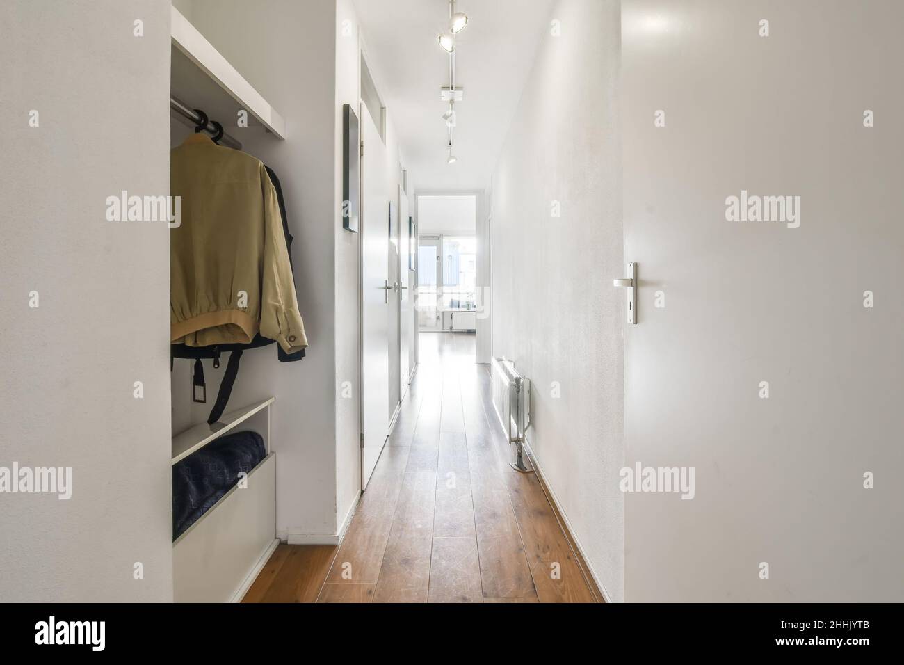 A long empty corridor designed in minimalistic style Stock Photo - Alamy