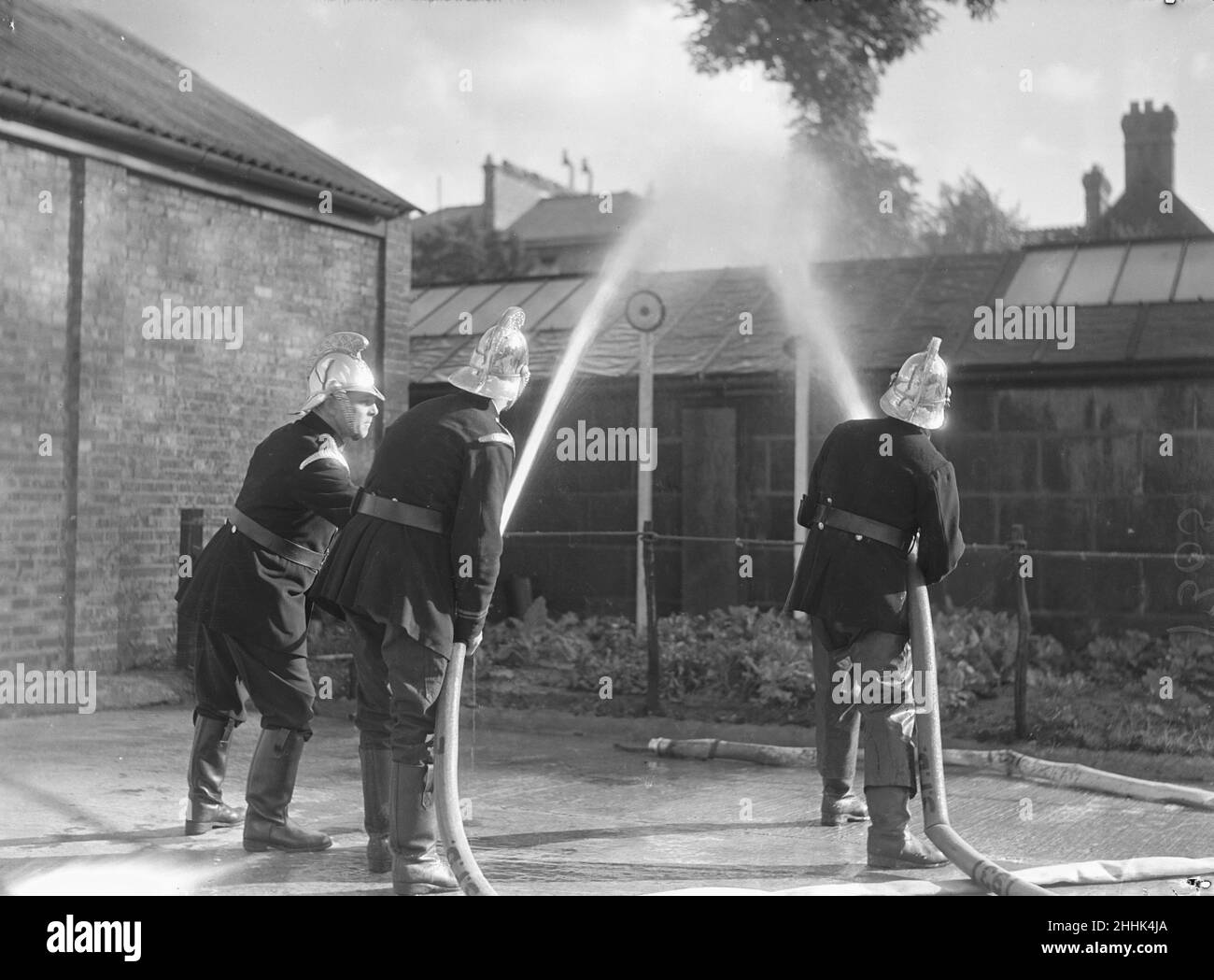 Surbiton Fire Brigade Display . October 1933 A firemen demonstrating ...