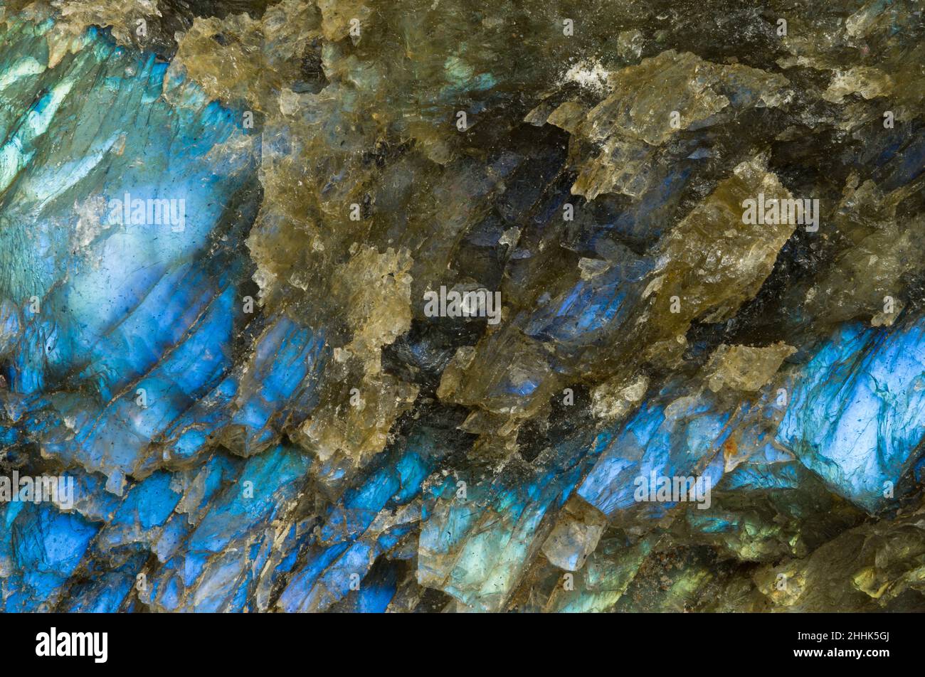 Close up of the rough cut exterior surface of a piece of labradorite ...