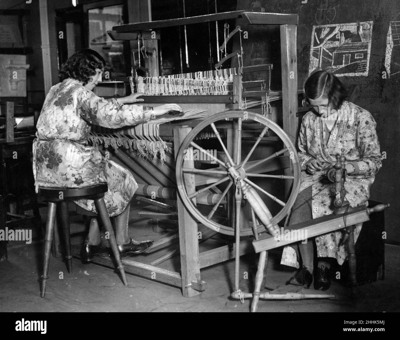 The hand loom and the spinning wheel, used by students in the School of ...